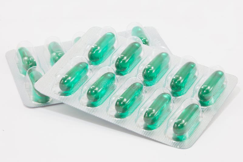 Green Color of Soft Capsules in the Strips Stock Image - Image of ...