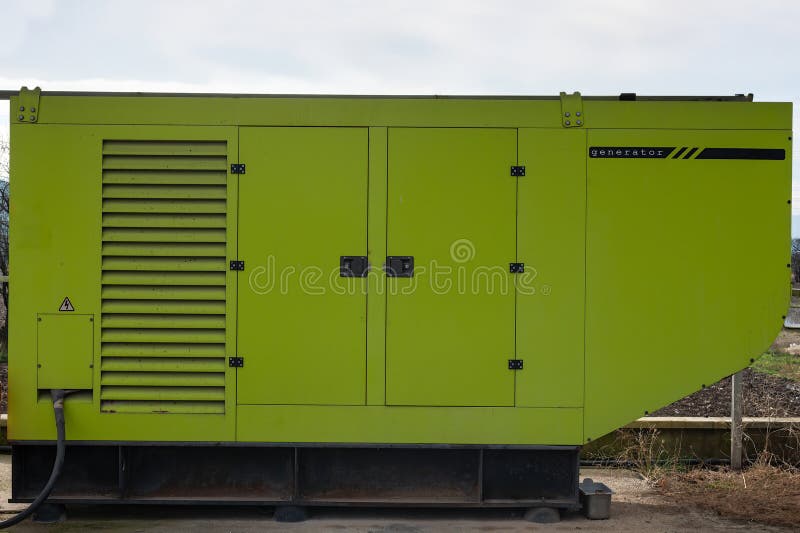Green Coloured Industrial Generator Placed in the Field. Stock Image ...