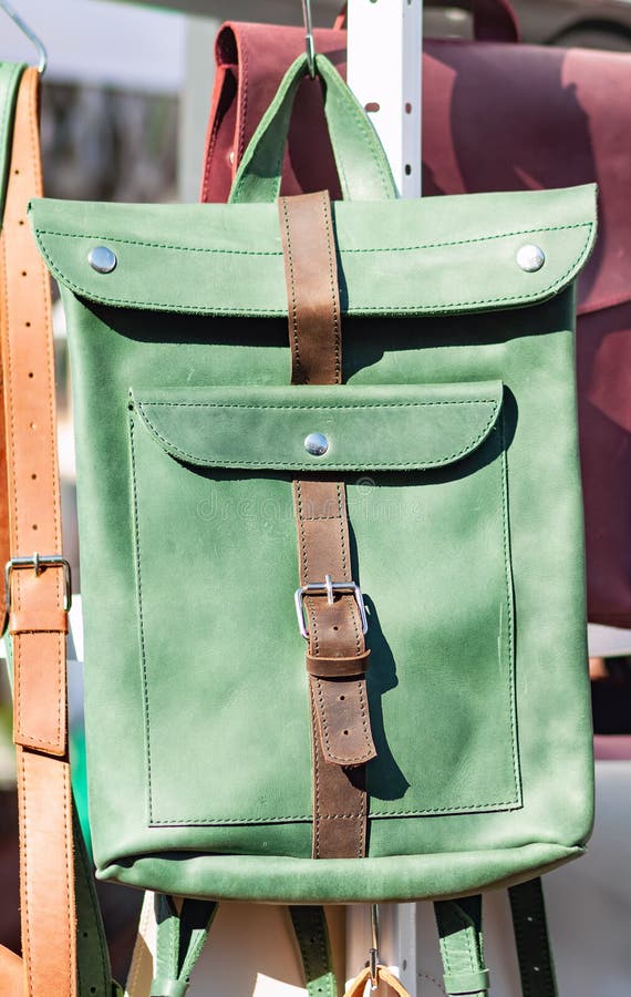 Green Leather Backpack in the Bright Midday Sun Stock Photo - Image of ...