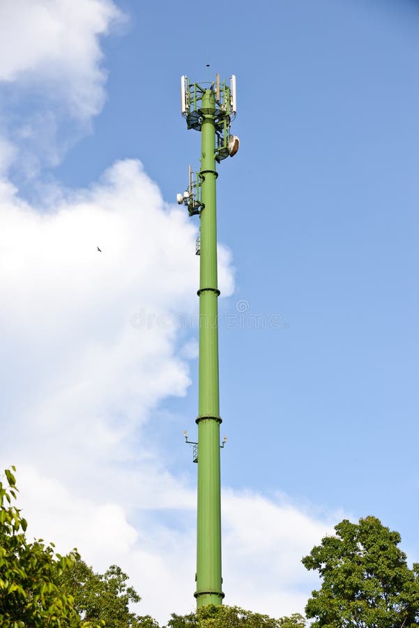Green communication towers stock image. Image of cable - 43925439