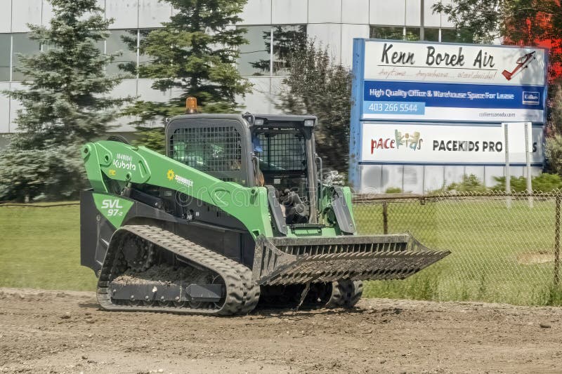A Green Construction Loader on a Tractor Flat Bed Editorial Stock Image ...
