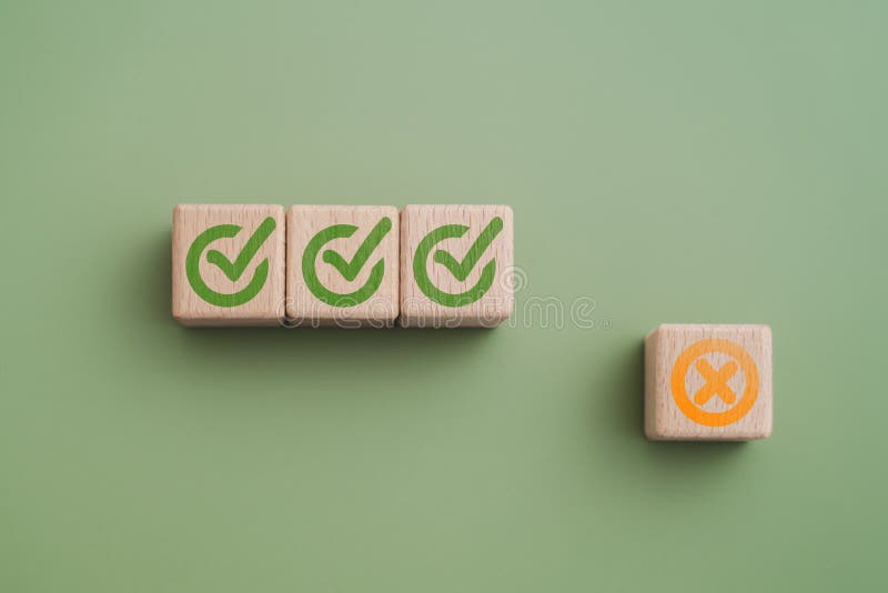 Green Correct Icon, and Orange Fade False on Wooden Cube from Her ...