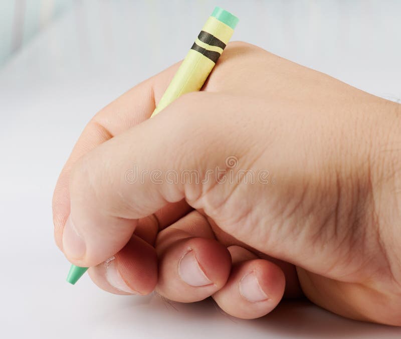 Green crayon in hand stock image. Image of vibrant, pastel - 172779463