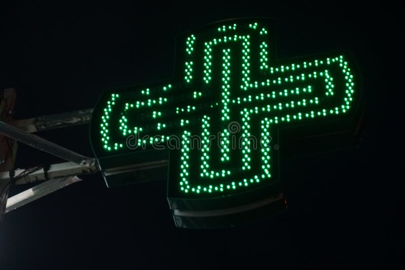 Green cross sign stock image. Image of store, signboard - 162033843