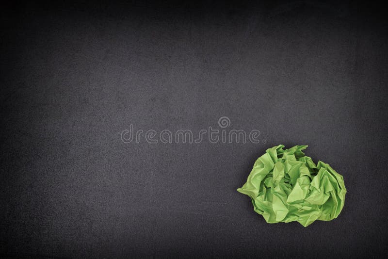 Green Crumpled Paper Ball on a Blackboard Stock Image - Image of ...