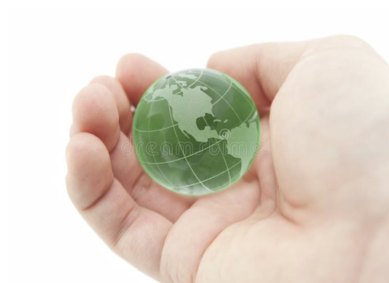 Green Crystal Globe in Hand Stock Photo - Image of global, careful ...