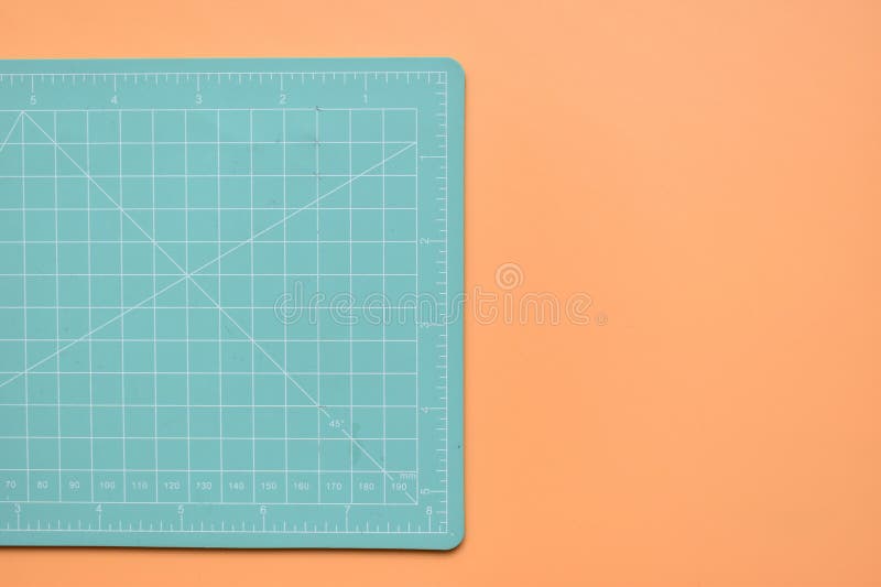Green Cutting Mat on Orange Background, Object Tool for Design Stock ...
