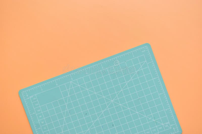 Green Cutting Mat on Orange Background, Object Tool for Design Stock ...