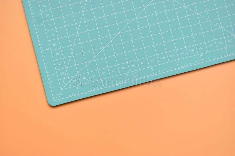 Green Cutting Mat on Orange Background, Object Tool for Design Stock ...