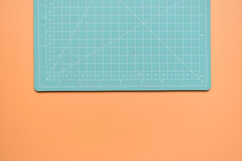 Green Cutting Mat on Orange Background, Object Tool for Design Stock ...
