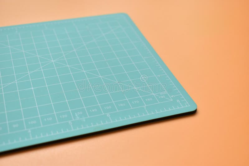 Green Cutting Mat on Orange Background, Object Tool for Design Stock ...