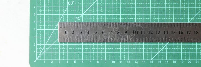 Green Cutting Mat with a Ruler Stock Photo - Image of measure, cutter ...