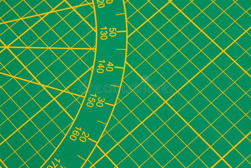 A Green Cutting Mat with Yellow Mathematical Markings that Enable ...