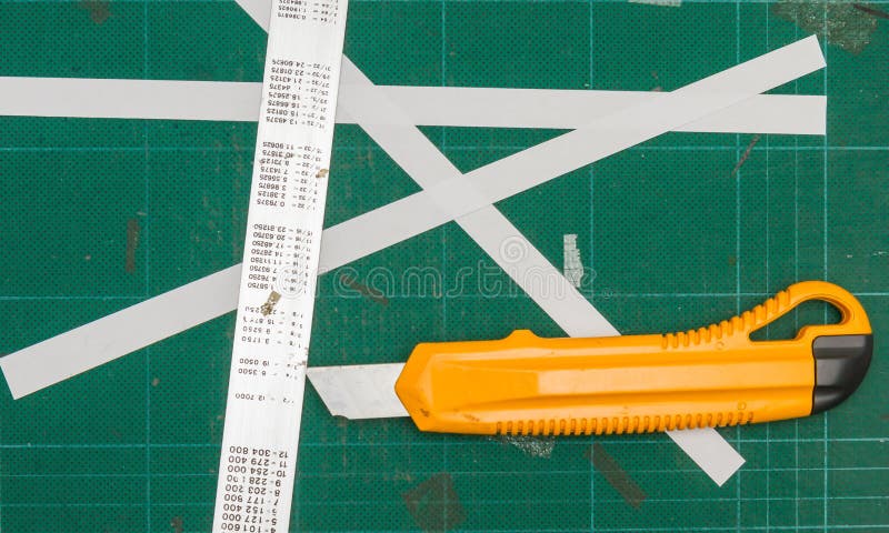 Green Cutting Mats with Iron Ruler and Cutter. Stock Image - Image of ...