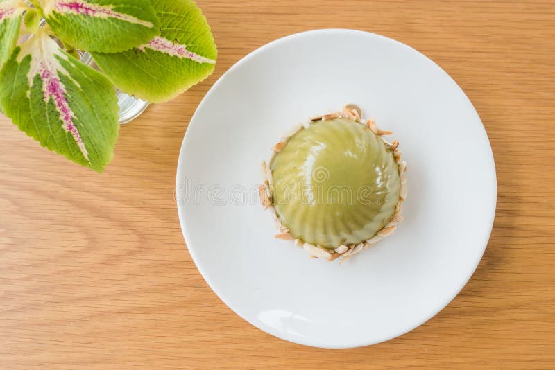 Green Dessert is Made from Green Tea with Red Bean Paste. in a White ...