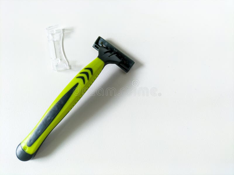 Green Disposable Razor on White Background Stock Photo - Image of ...