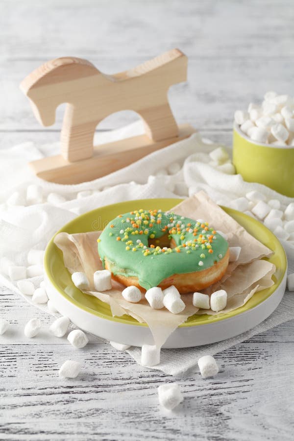 Green Donuts with Mini Marshmallow on Table Stock Photo - Image of bake ...