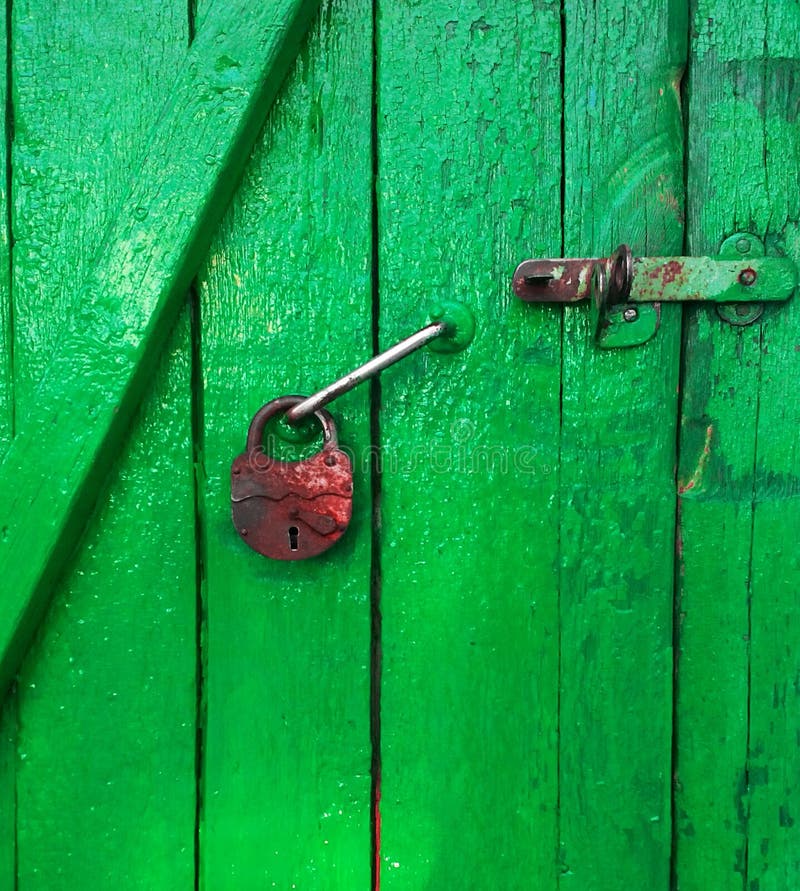 Green door and old lock stock photo. Image of lock, brown - 51703148