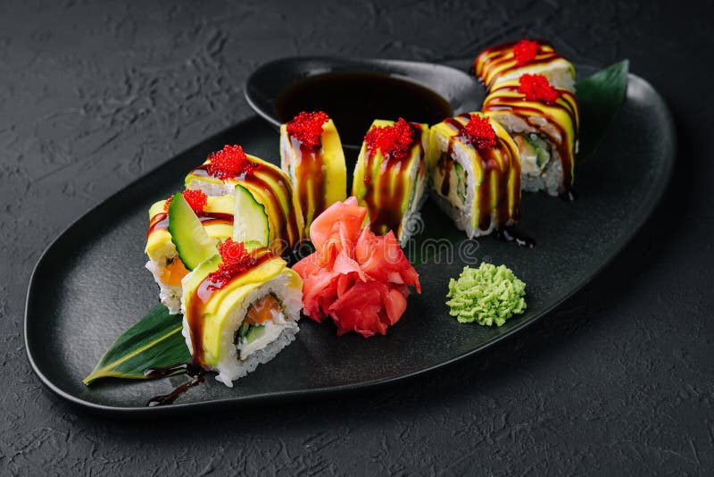 Green Dragon Sushi Roll with Eel on Black Stone Stock Photo - Image of ...
