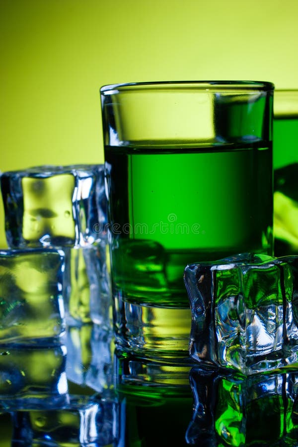 Green drink with ice cubes stock image. Image of luxury - 25301411