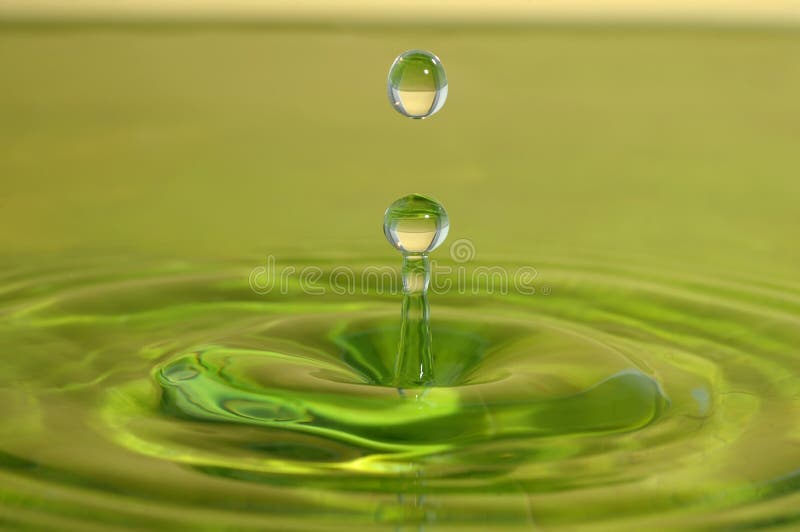 Green Drop Fall on Water Surface Stock Image - Image of clear, fall ...