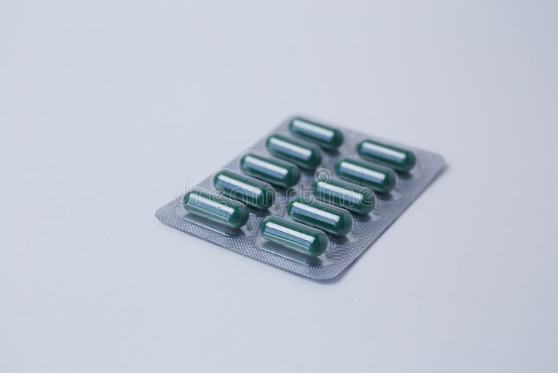 Green drug capsule stock photo. Image of drug, pack, health - 86481392