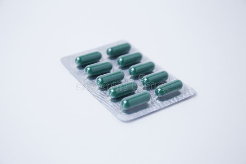 Green drug capsule stock photo. Image of package, pack - 86481430