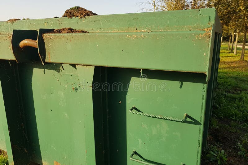 Green Dumpster for Garbage in the Field Stock Photo - Image of large ...