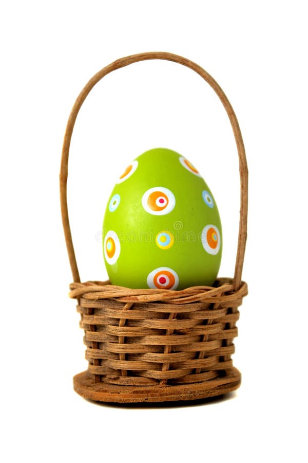 Green Easter Egg into a Basket Stock Photo - Image of easter, food ...