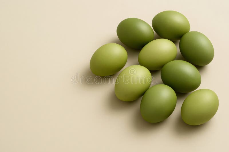 Green Easter Eggs Scattered Across Pale Mint Surface, Forming ...