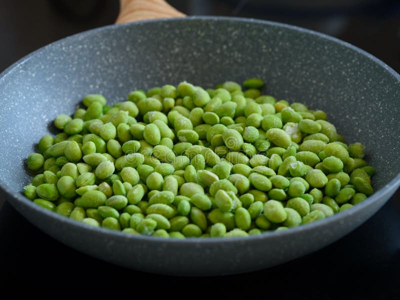 Green Edamame Soy Beans in Frying Pan Ready To Be Cooked Stock Photo ...