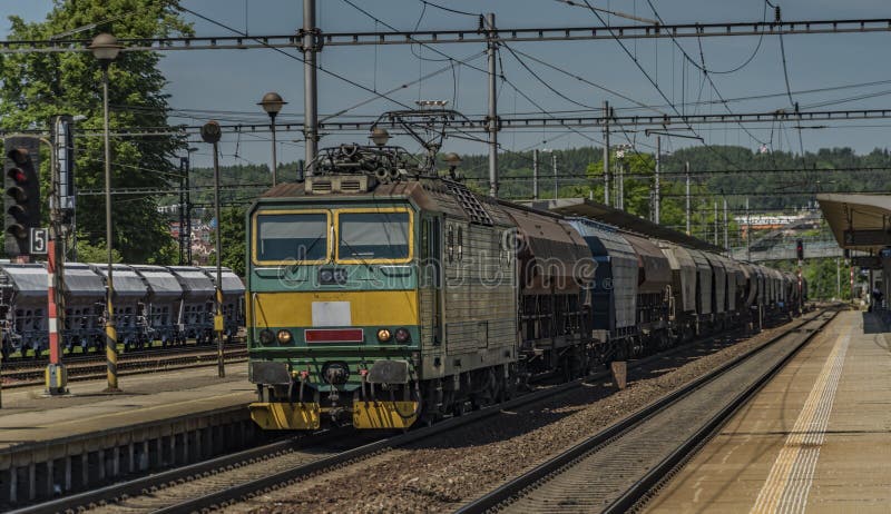 Green Electric Engine with Cargo Train Stock Image - Image of rail ...