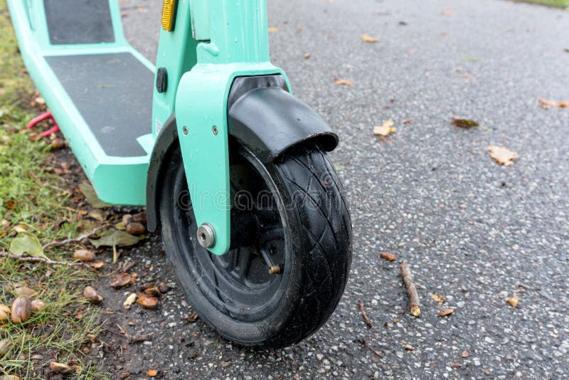 Green Electric Scooter with a Small Front Wheel Stock Photo - Image of ...