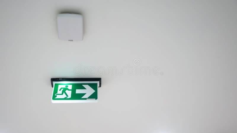 Green Emergency Exit Sign. Direction To the Escape Way on White Stock ...