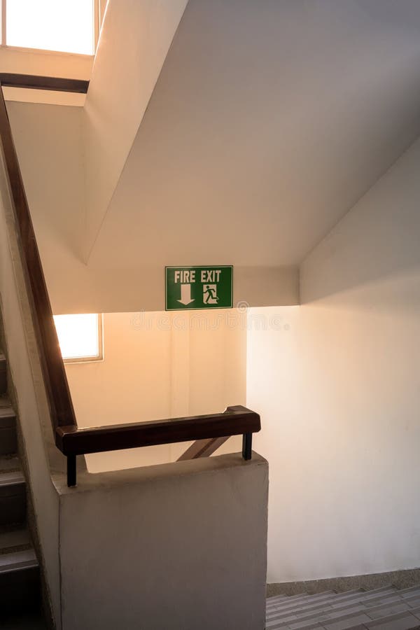 Green Emergency Exit Sign. Direction To the Escape Way Stock Photo ...