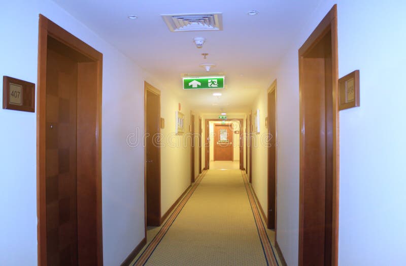 Green Emergency Exit Sign in Hotel Showing the Way To Escape Stock ...