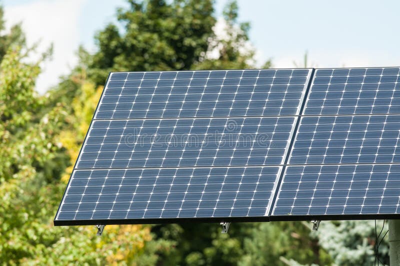 Green Energy - Photovoltaic Solar Panel with Trees Stock Image - Image ...