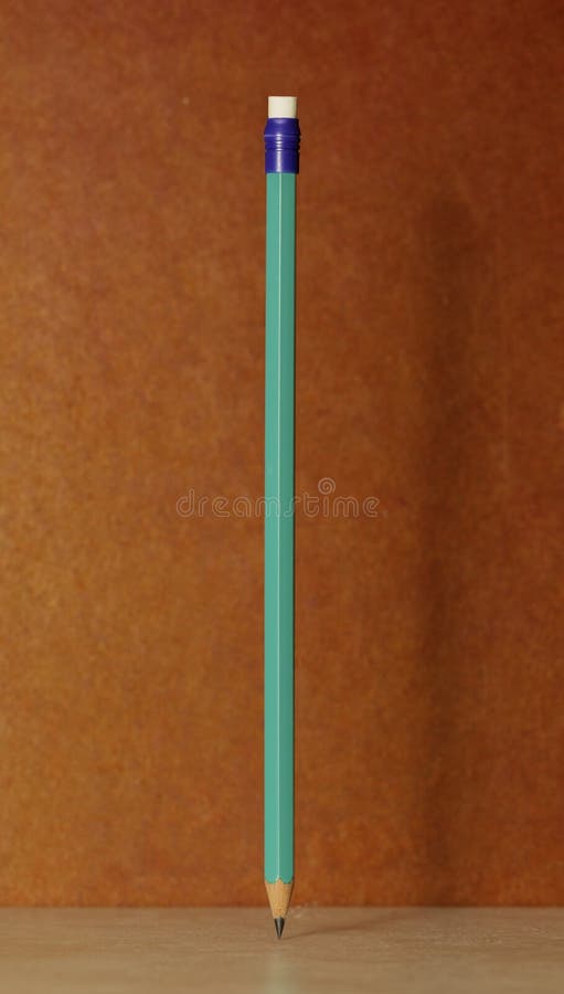 Pencil Balancing Act, Against a Red Background. Stock Image - Image of ...