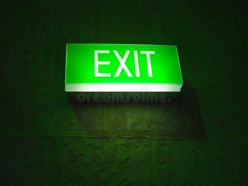 Green exit sign in night stock photo. Image of security - 187324466