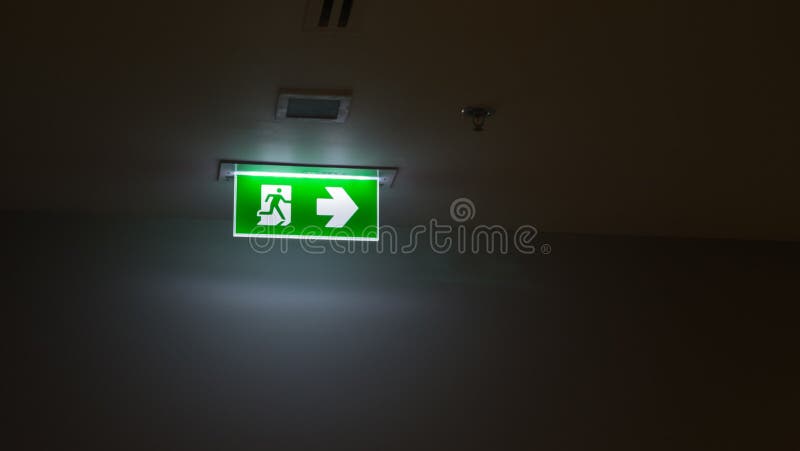 Green Exit Sign in the Office Building Stock Photo - Image of floor ...
