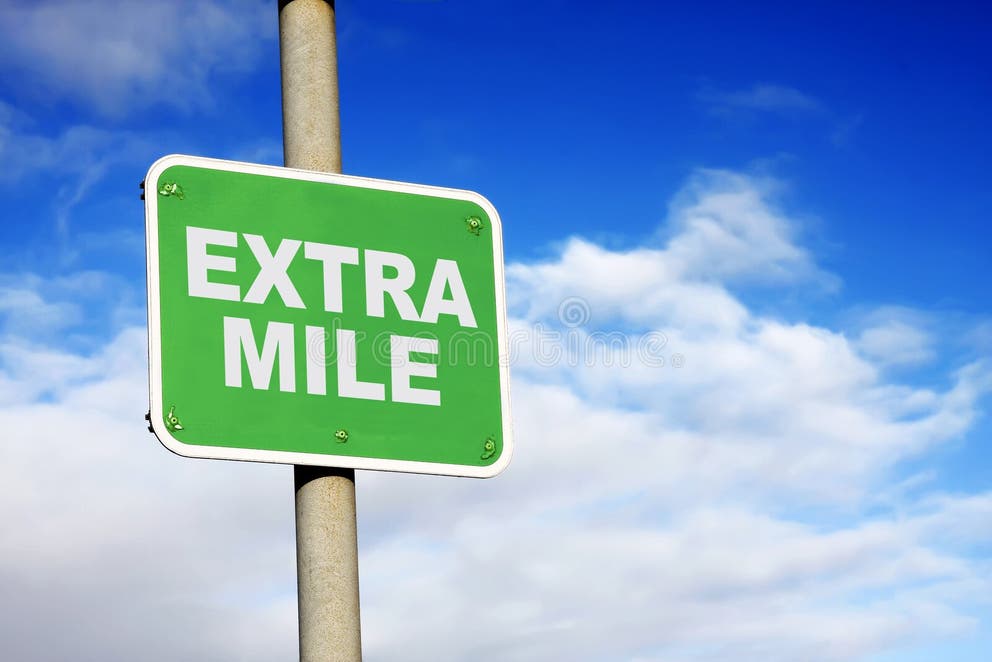 Green extra mile sign stock photo. Image of faster, blue - 25503060