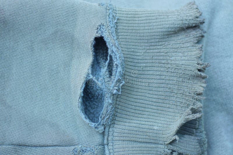 Fabric Texture of Torn Old Clothes with a Hole Stock Photo - Image of ...