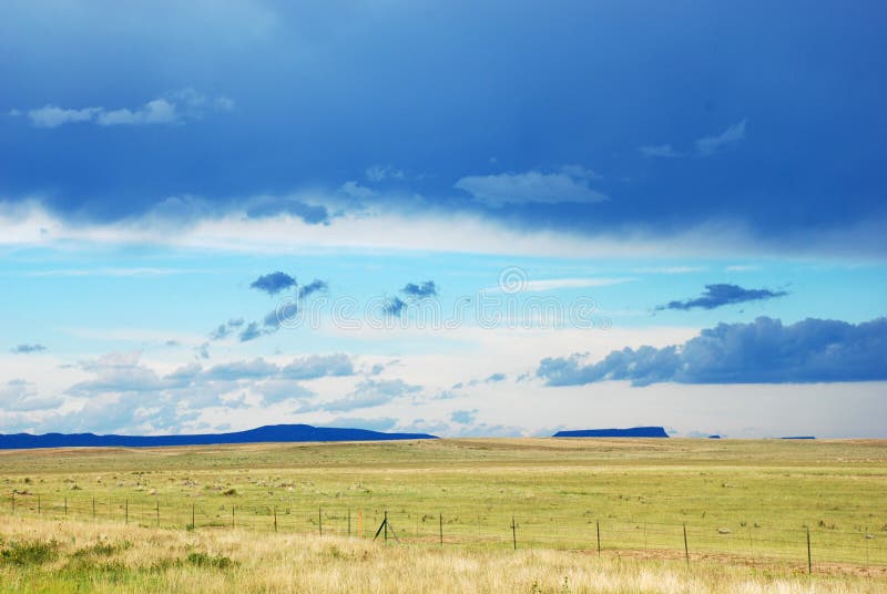 Green Field and Distant Blue Mountains Stock Photo - Image of spacious ...