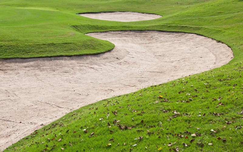 The green field with sand stock photo. Image of lawn - 31221316