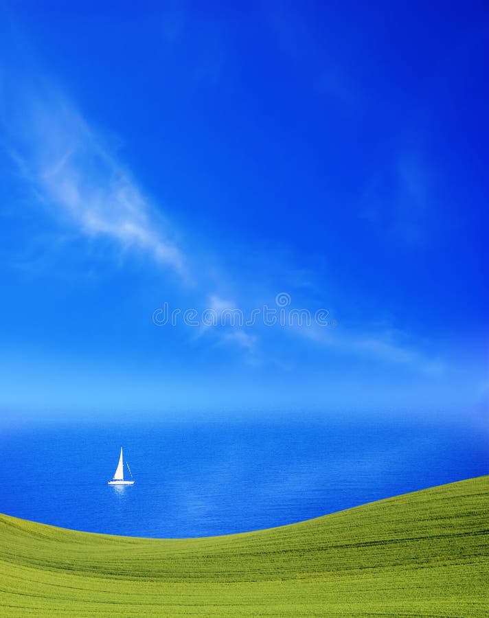 Green field, sea and sky stock image. Image of hills, brightly - 9605781