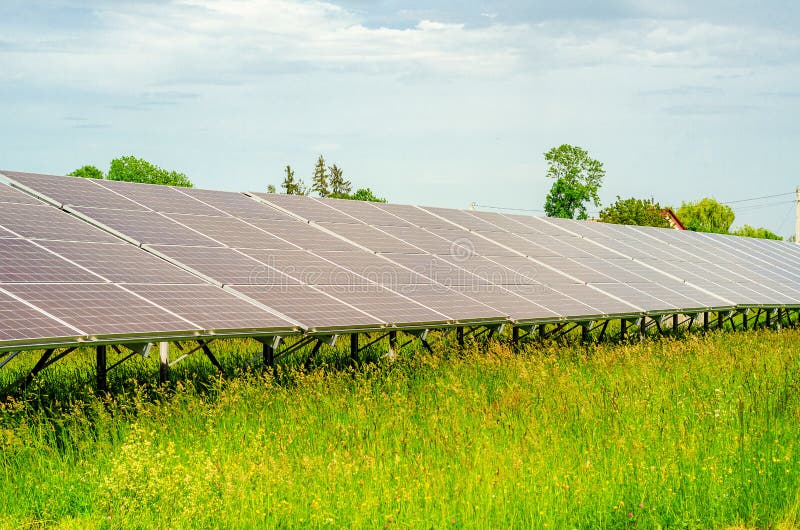Green Field with Solar Panels. Alternative Energy Stock Photo - Image ...
