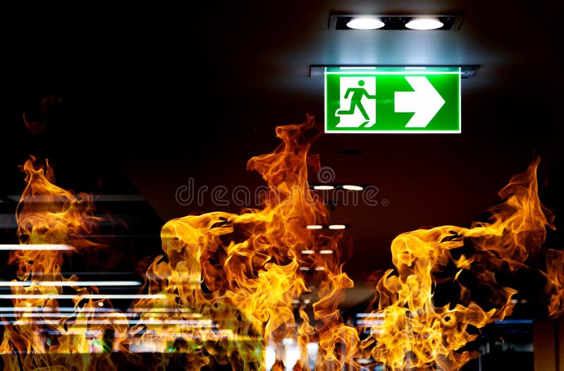 Green Fire Escape Sign Hang on the Ceiling in the Office Stock Image ...