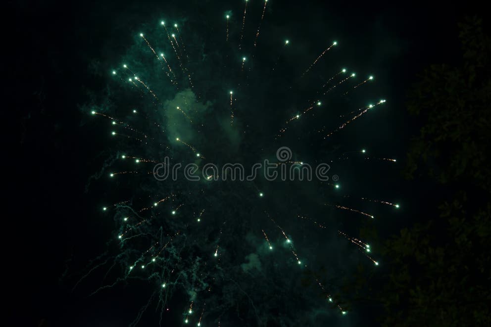 Green Firework in Smoke stock image. Image of pyrotechnic - 327153997