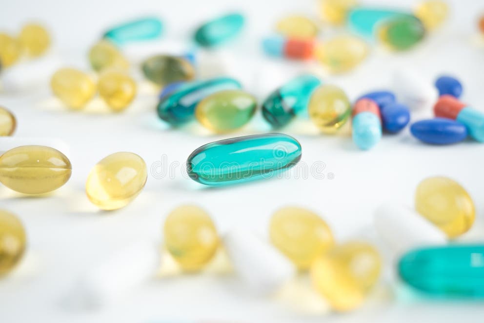 The Green Fish Oil Capsule and Pills, Selective Focus Stock Photo ...