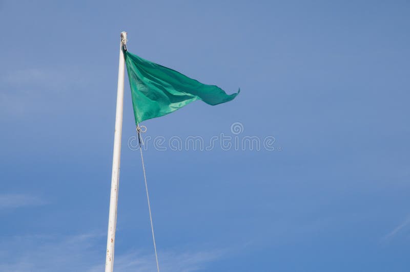 Green flag stock image. Image of signal, flag, windy, simple - 6514285